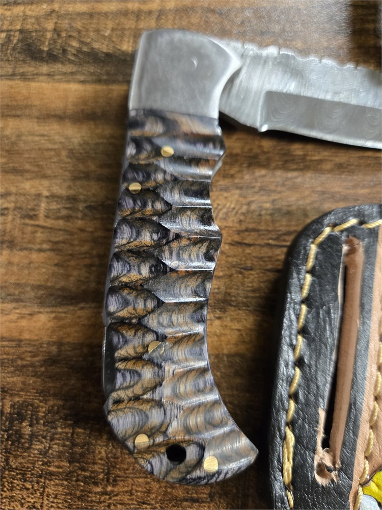 WildLife Buyer, LLC. - Custom made Damascus folding stag handled knives ...