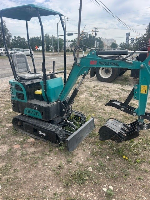 WildLife Buyer, LLC. - MINI EXCAVATOR WITH A THUMB AND RACK AND A BUCKET